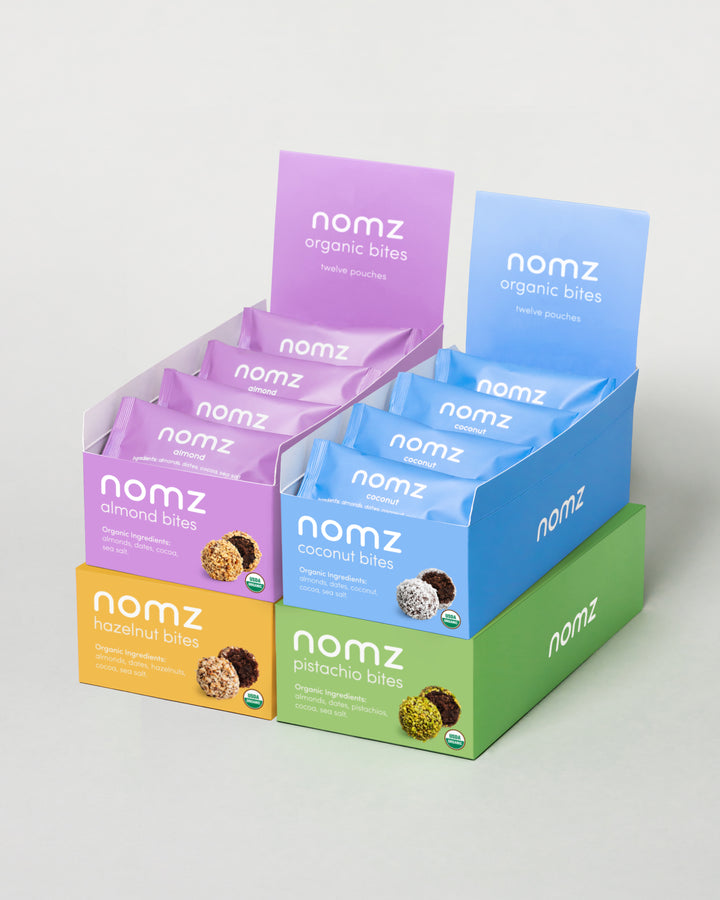 nomz: treat your body · organic snacks, superfoods, nut butters + more